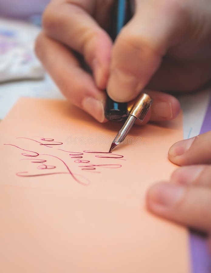 Process of Calligraphy Handwriting with an Ink Fountain Pen Feather ...
