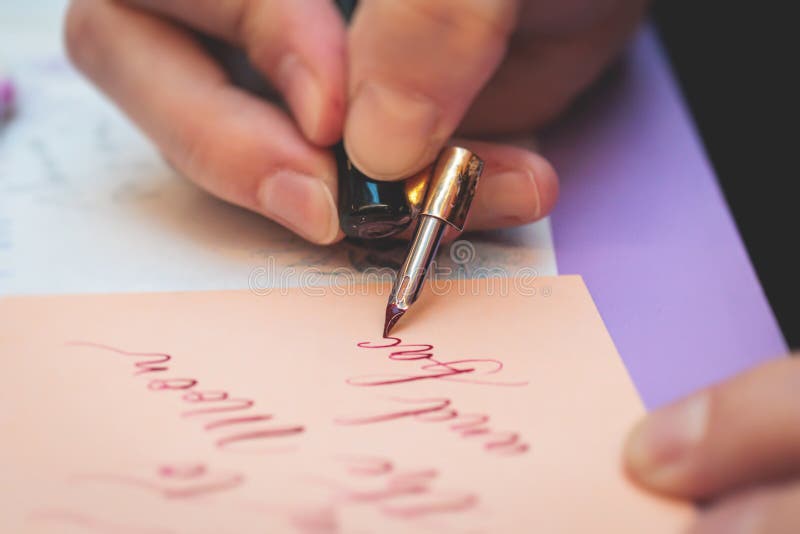 Process of Calligraphy Handwriting with an Ink Fountain Pen Feather ...