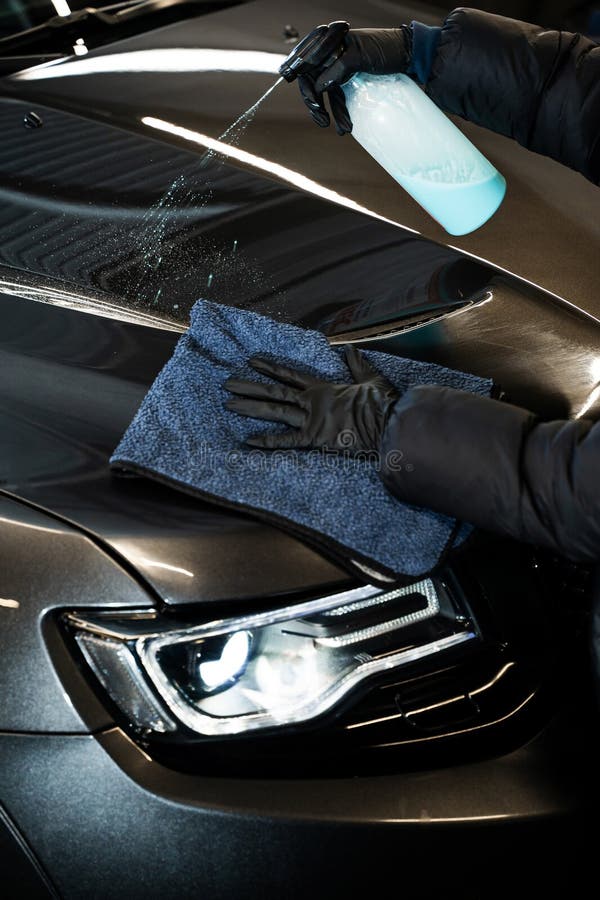 Process of Car Detailing at Car Service. Applying Spray of Quick ...