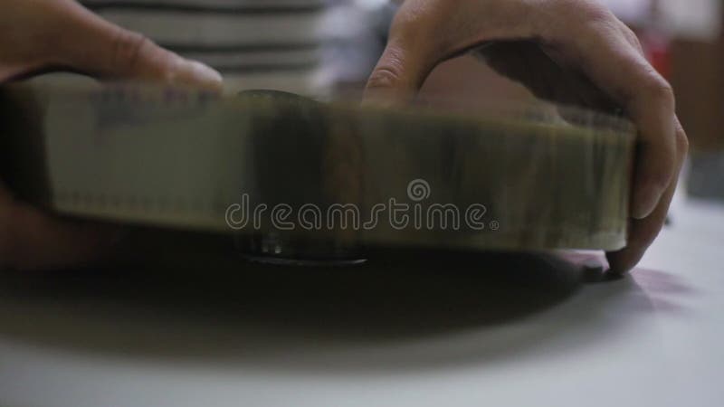 The Process of Charging Film in the Coil Stock Footage - Video of ...