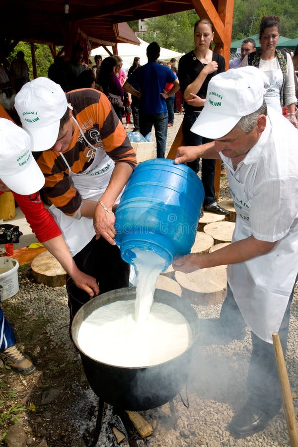 Cheesemakers at work editorial photography. Image of handmade - 123476977