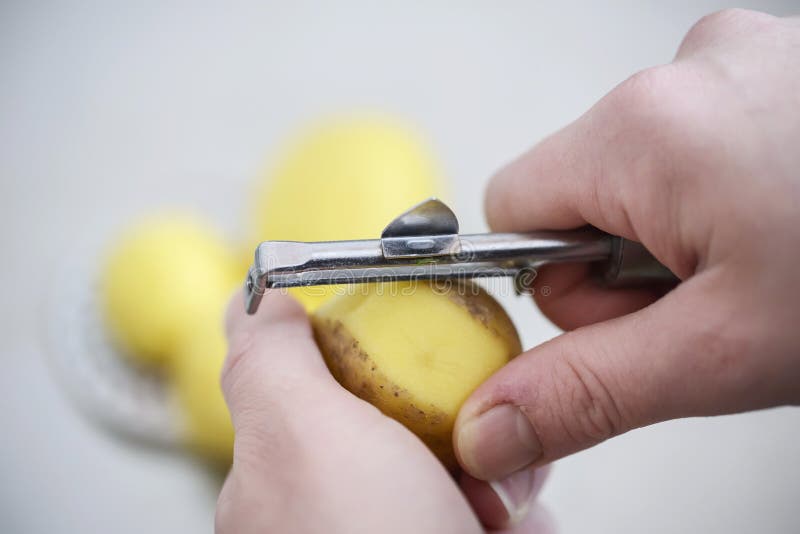 Process of Cleaning Potatoes for Cooking a Special Knife with a Stock ...