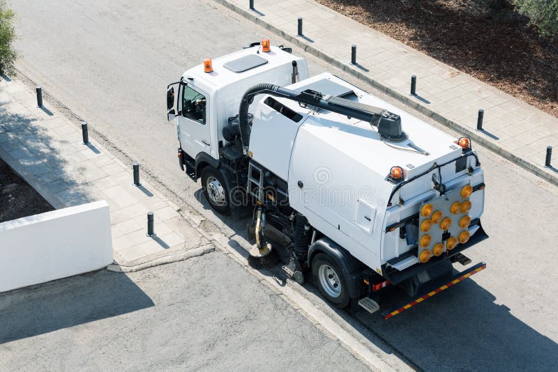 Process of Cleaning Street with a Modern Cleaning Machine. Stock Image ...