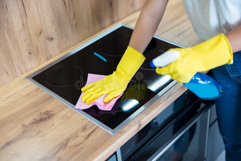 Process of Cleaning. Woman`s Hands in Yellow Gloves Using Detergent ...