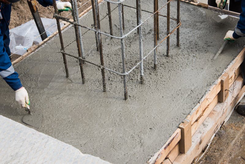 The Process of Compacting and Smoothing Fresh Concrete. Concrete is ...