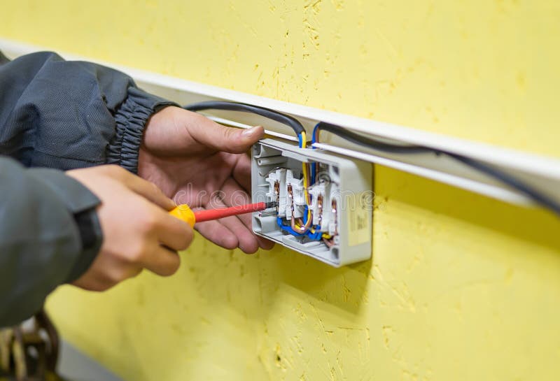 The Process of Connecting Cables To a Dual Socket Stock Image - Image ...