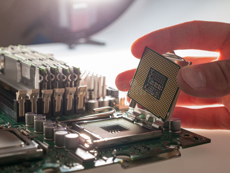 The Process of Connecting the CPU To the Processor Socket on a Modern ...