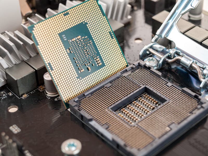 The Process of Connecting the CPU To the Processor Socket on a Modern ...