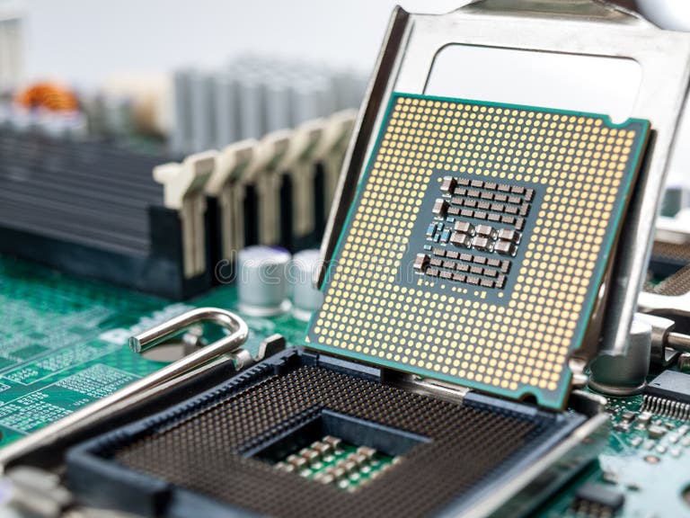 The Process of Connecting the CPU To the Processor Socket on a Modern Computer Motherboard ...