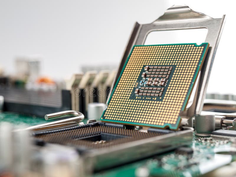 The Process of Connecting the CPU To the Processor Socket on a Modern Computer Motherboard ...