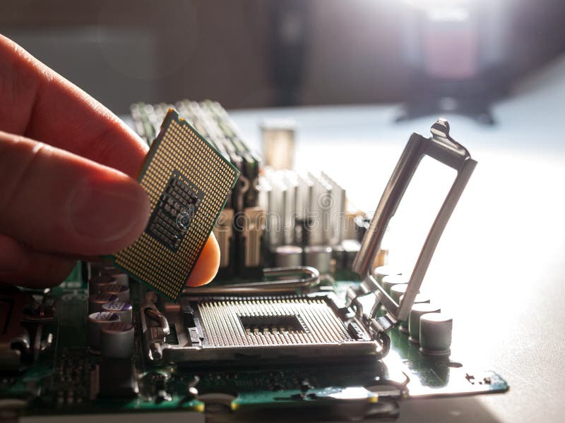 The Process of Connecting the CPU To the Processor Socket on a Modern ...