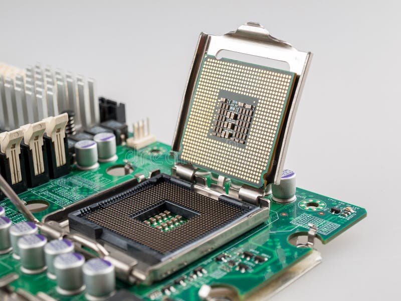 The Process of Connecting the CPU To the Processor Socket on a Modern Computer Motherboard ...