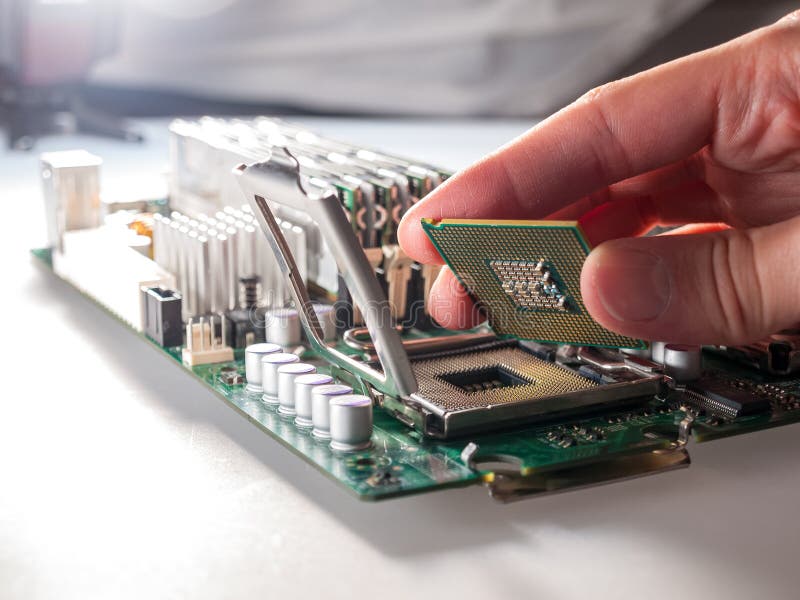 The Process of Connecting the CPU To the Processor Socket on a Modern ...