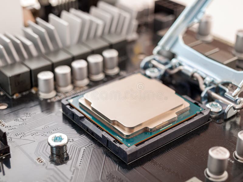 The Process of Connecting the CPU To the Processor Socket on a Modern Computer Motherboard ...