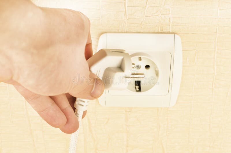 The Process of Connecting the White Plug into the Socket Stock Photo ...