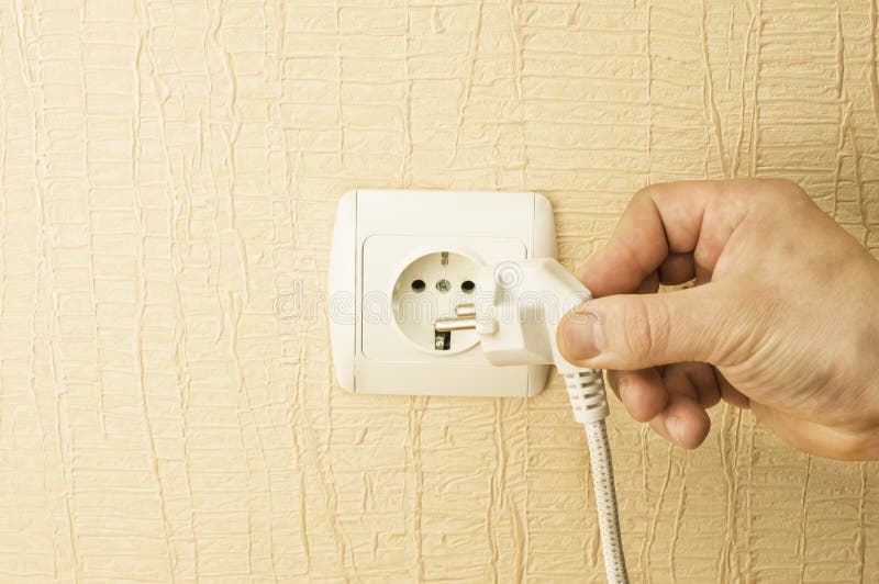 The Process of Connecting the White Plug into the Socket Stock Image ...