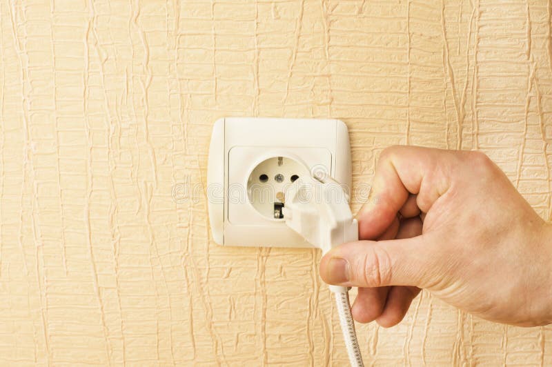 The Process of Connecting the White Plug into the Socket Stock Image ...