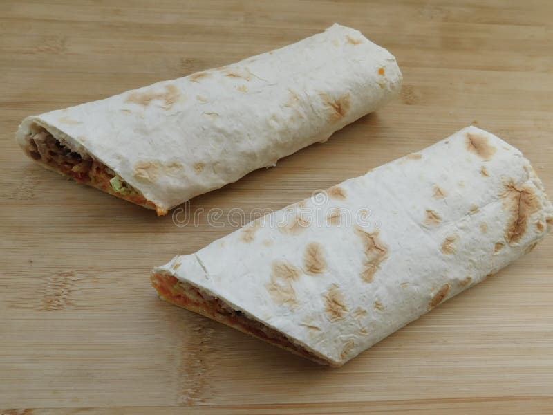 The Process of Cooking Chicken Wrap on Kitchen Table at Home Concept ...