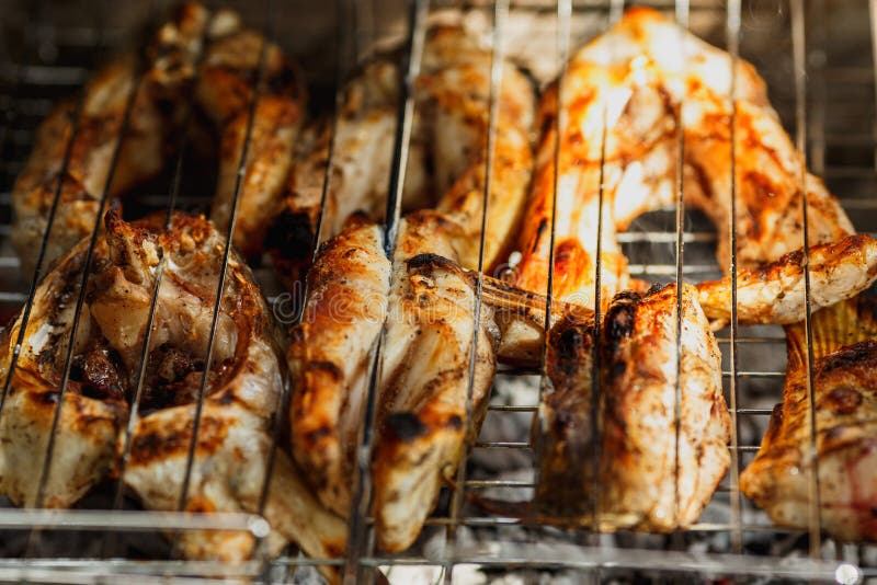 The Process of Cooking Fish on the Grill Stock Photo - Image of black ...