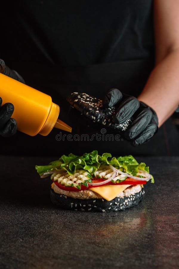 Process of Cooking Hamburger. Chef on the Kitchen Table Making Out the ...