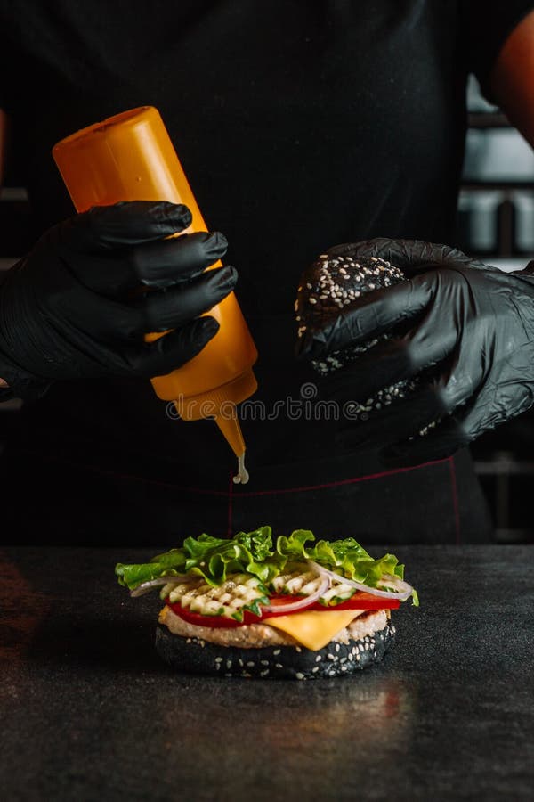Process of Cooking Hamburger. Chef on the Kitchen Table Making Out the ...