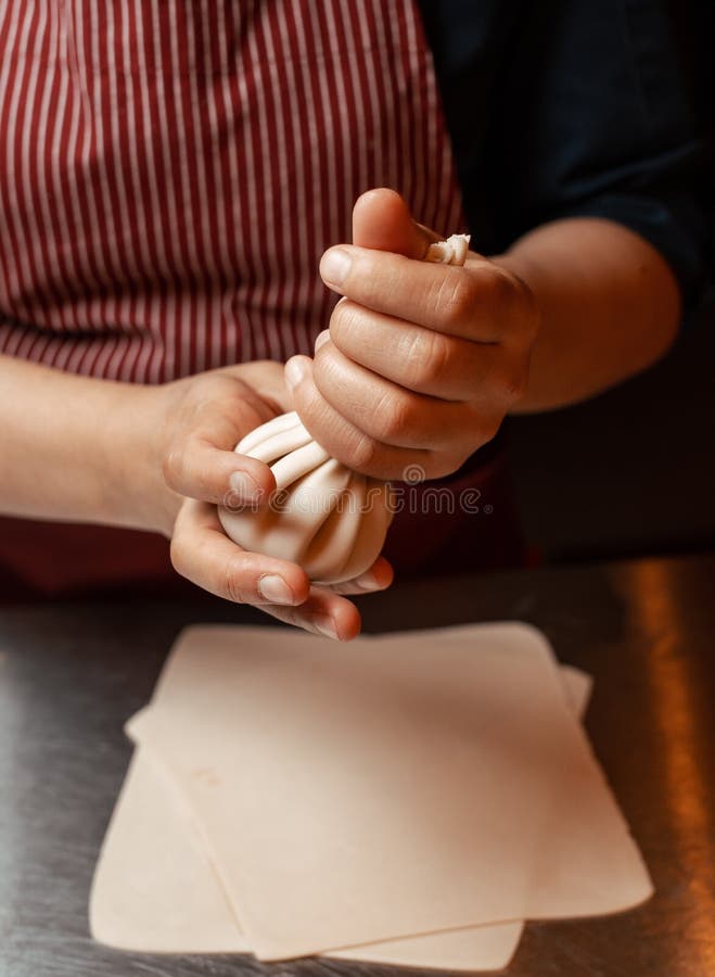 The Process of Cooking Khinkali - Dishes of Caucasian Cuisine. Woman ... The Process of Cooking Khinkali - Dishes of Caucasian Cuisine. Woman ...