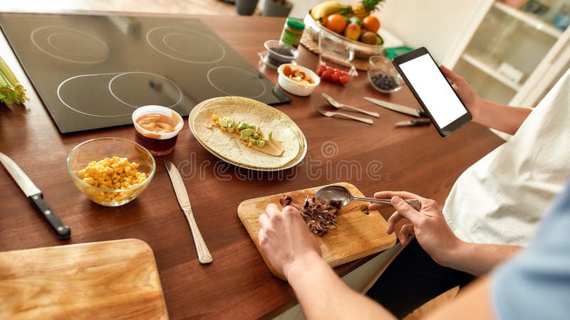 Close Up of Process of Cooking. Man Preparing Meal while Woman Checking ...