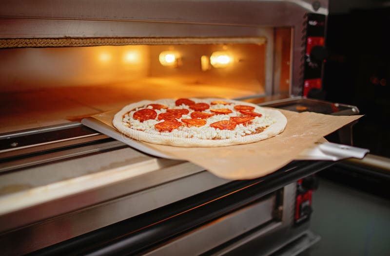 Process of Cooking Pepperoni Pizza in the Oven Stock Image - Image of ...