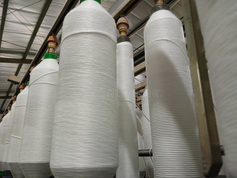Process of Cotton into Yarn on a Spinning Machine in the Textile Stock ...