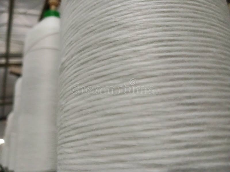 Process of Cotton into Yarn on a Spinning Machine in the Textile Stock ...