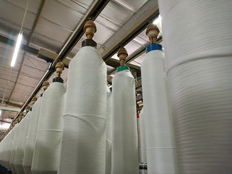 Process of Cotton into Yarn on a Spinning Machine in the Textile Stock ...
