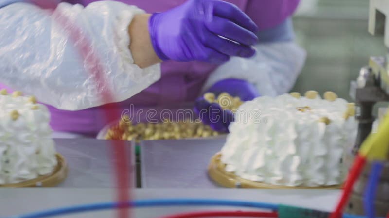 The Final Step in Making the Cake. Completion of the Cake at the ...