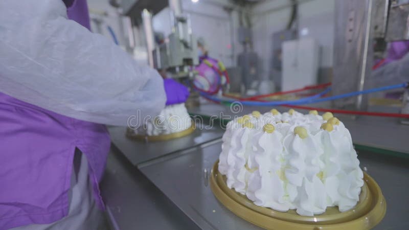 The Final Step in Making the Cake. Completion of the Cake at the ...