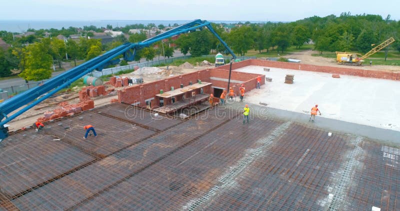 Workers Create Concrete Formwork. Concrete Slab Creation. Construction ...