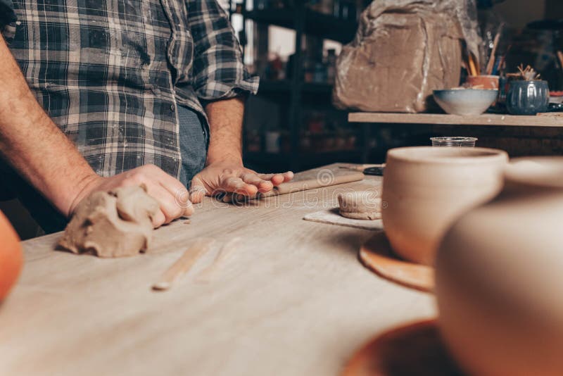 Male Potter Rolls Clay To Create a Cup Stock Photo - Image of creation ...