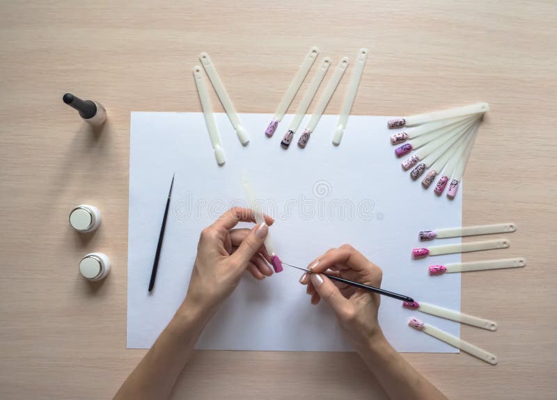The Process of Creating a Drawing on Tips. Nail Art Design. Stock Image ...