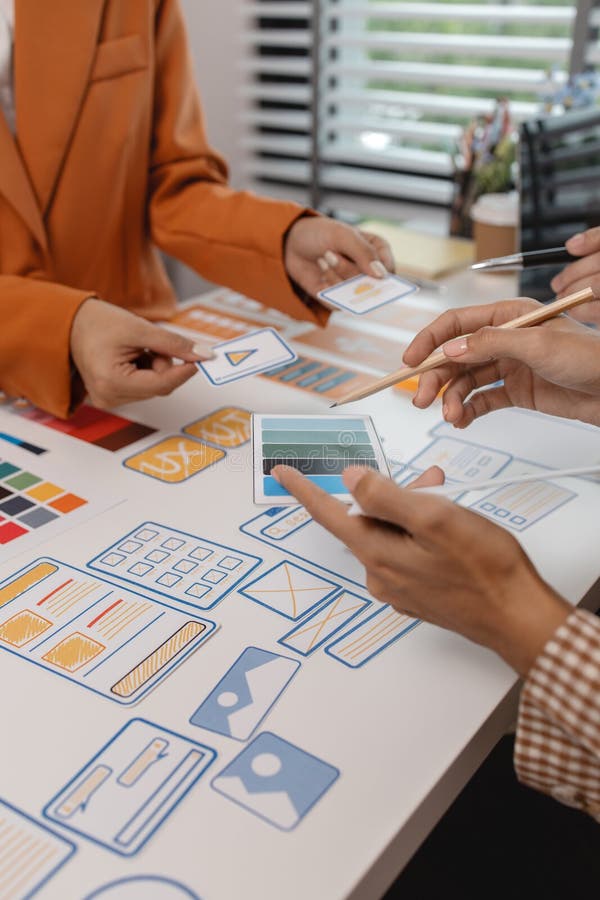 Ux Developer and UI Designer Team Brainstorm Together about Designing ...