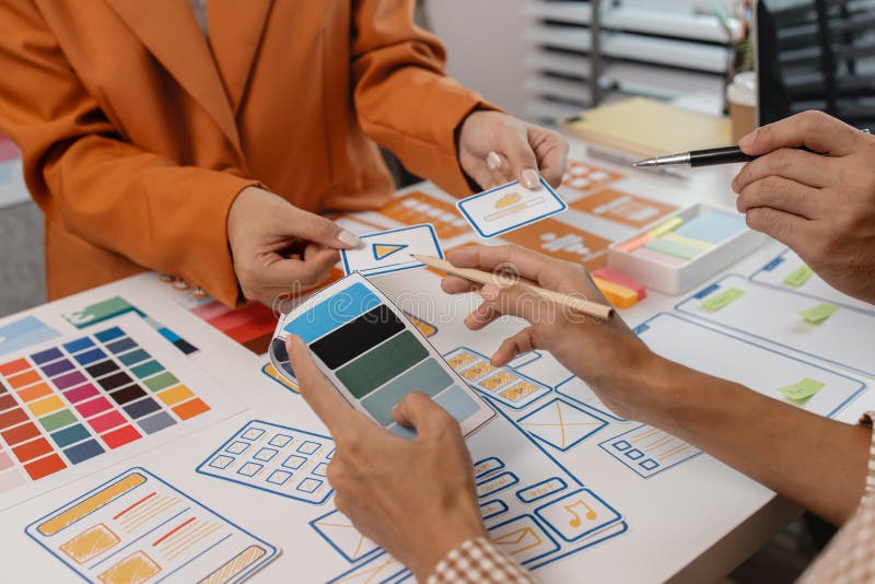 UX Developer and Ui Designer Brainstorming about Mobile App Interface ...