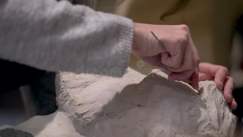 The Process of Creating Sculpture. the Sculptor is Working Stock ...