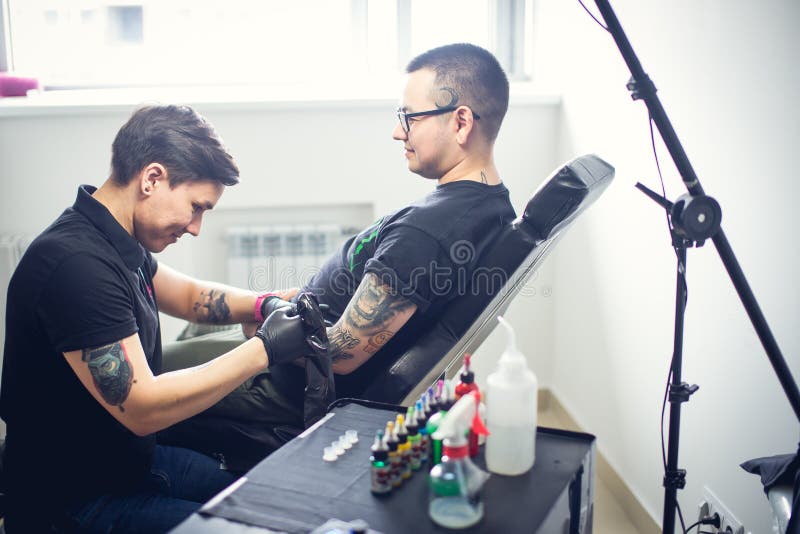 The Process of Creating a Tattoo. Stock Photo - Image of female ...