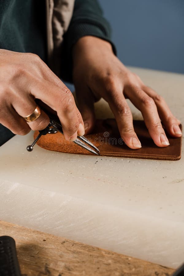 Process of Creation Genuine Leather Product. Craftsman is Cutting ...