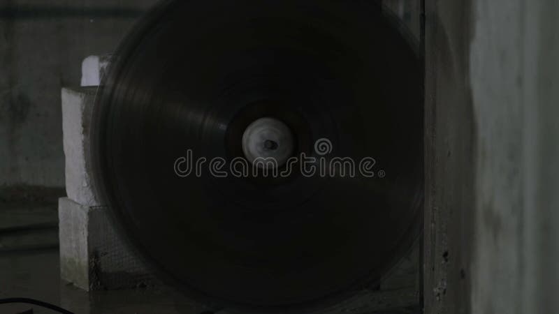 The Process of Cutting a Concrete Wall. the Round Disc Cuts Concrete ...