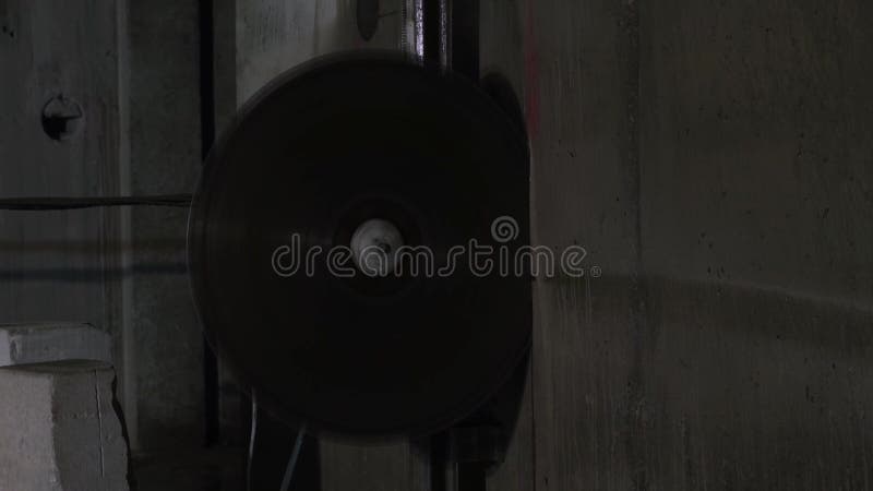 The Process of Cutting a Concrete Wall. the Round Disc Cuts Concrete ...