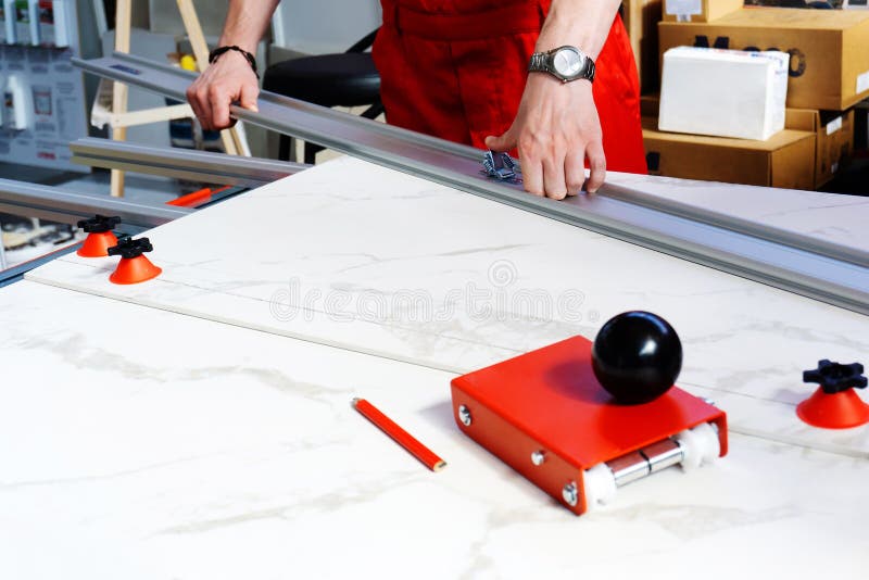 The Process of Cutting a Marble Slab Using Special Tools. Work with ...