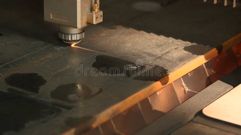 The Process of Cutting Parts from a Sheet of Metal Using a CNC Machine ...