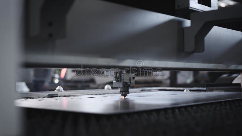 The Process of Cutting Parts from a Sheet of Metal Using a CNC Machine ...