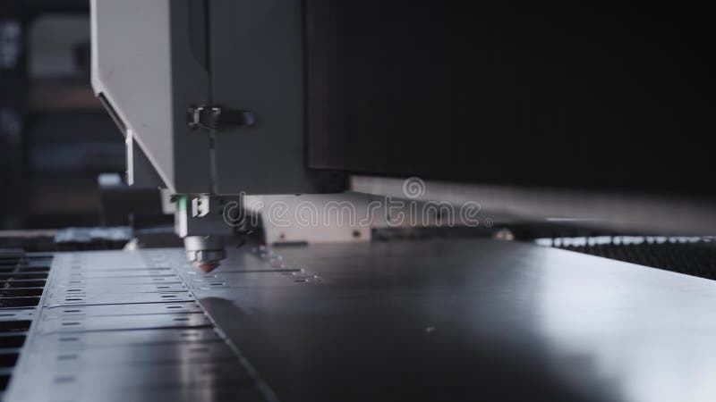 The Process of Cutting Parts from a Sheet of Metal Using a CNC Machine ...