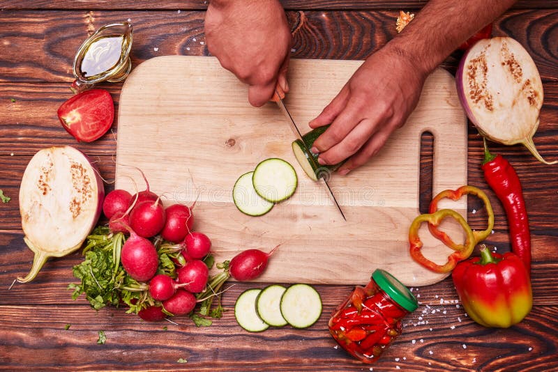 The Process of Cutting Vegetables on a Cutting Board. Stock Image ...