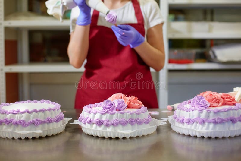 The Process of Decorating Cakes in a Pastry Shop. a Pastry Chef Makes ...