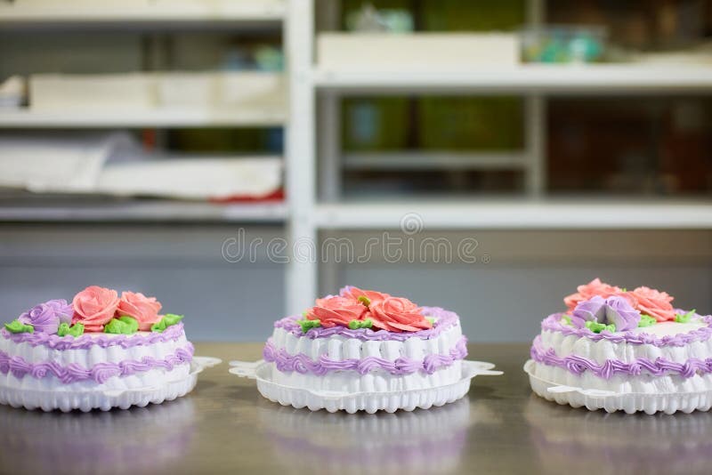 The Process of Decorating Cakes in a Pastry Shop. a Pastry Chef Makes ...